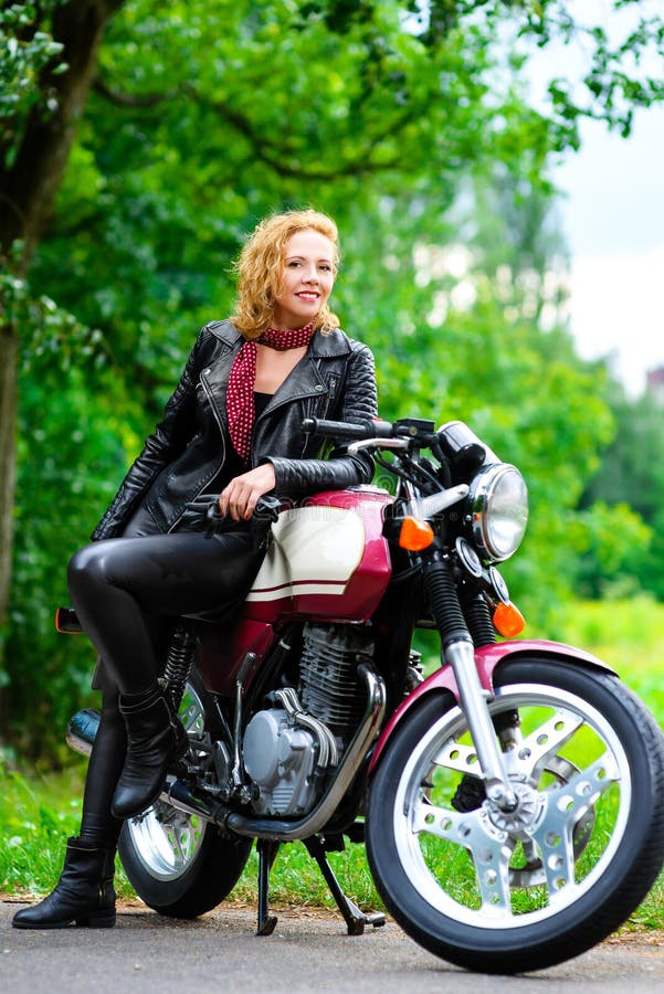 Biker Girl in Leather Jacket on a Motorcycle Stock Photo - Image of ...