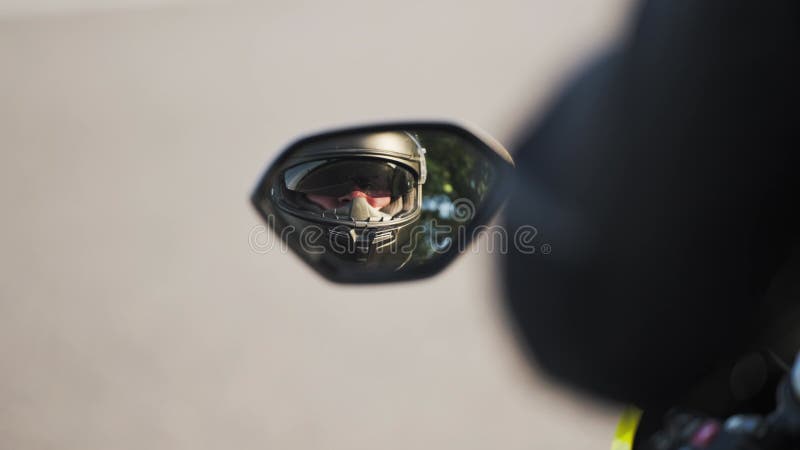 Biker in Helmet Looking into a Side Mirror of Motorcycle Stock Video ...