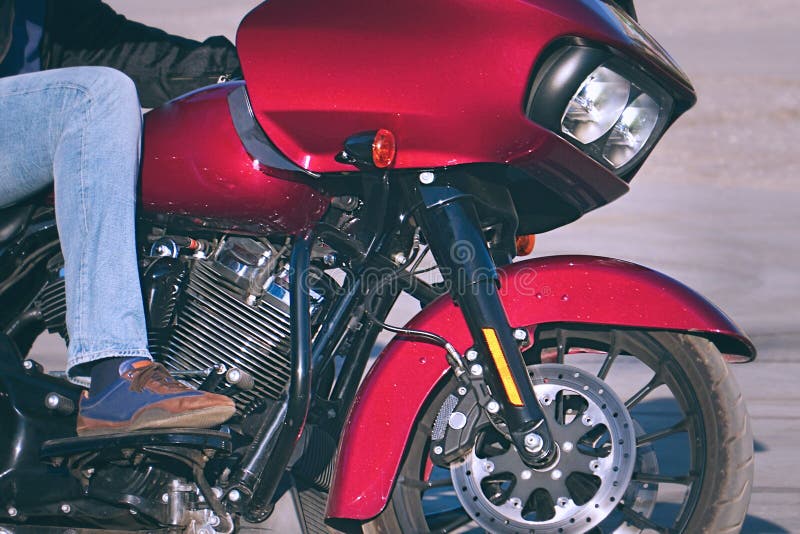 Biker in Jeans Riding a Red Motorcycle. Side View Editorial Stock Image ...