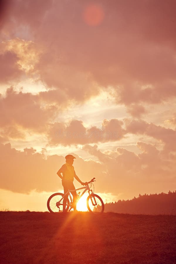 Biker in morning mood stock image. Image of bike, mountain - 48850045