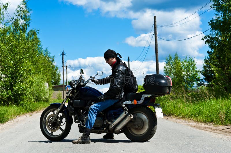 Biker on a motorcycle stock image. Image of road, unconventional - 25083251