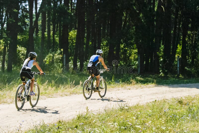 Bikers at an off-road race editorial image. Image of exercise - 68255800