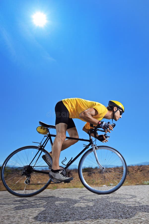 Cyclist Riding a Bike Uphill Stock Image - Image of racer, movement ...