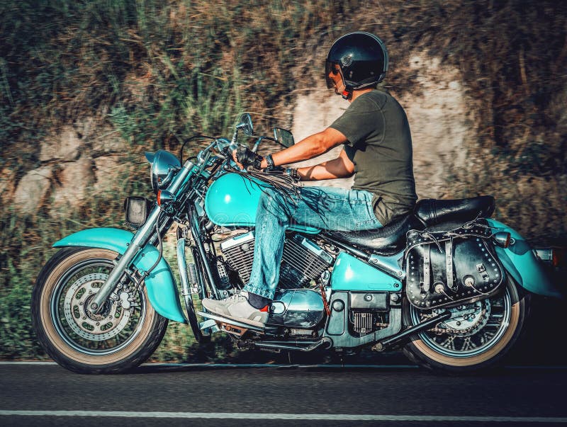 Biker Riding a Classic Motorcycle on a Country Road Stock Image - Image ...