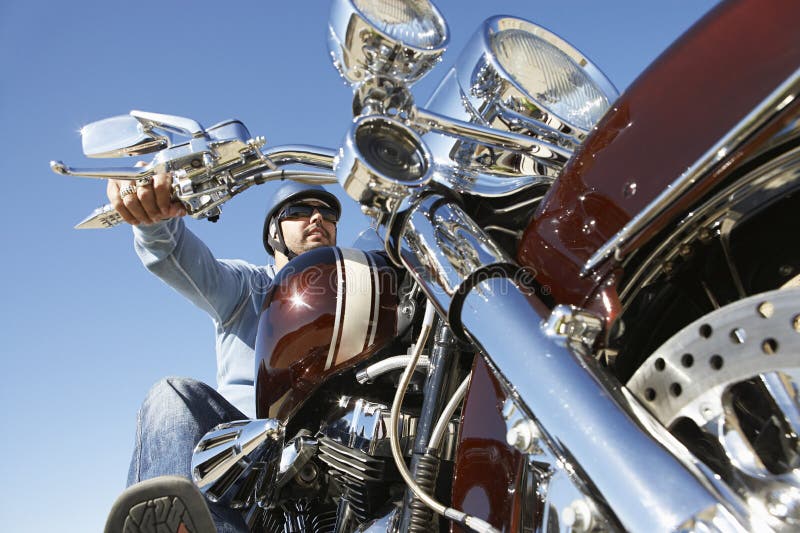 Young Adult Biker Riding a Chopper Motorcycle Stock Image - Image of ...