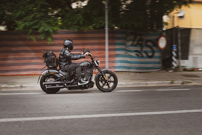 Biker Riding a Motorcycle on a City Street Editorial Stock Image ...