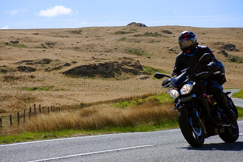 Biker Riding on Rural Road . Editorial Stock Photo - Image of clouds ...