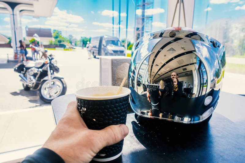 Biker in a Roadside Cafe at a Gas Station Drinking Coffee Stock Image ...