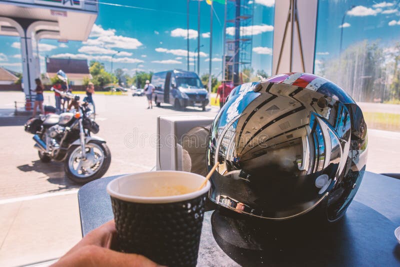 Biker in a Roadside Cafe at a Gas Station Drinking Coffee Stock Image ...