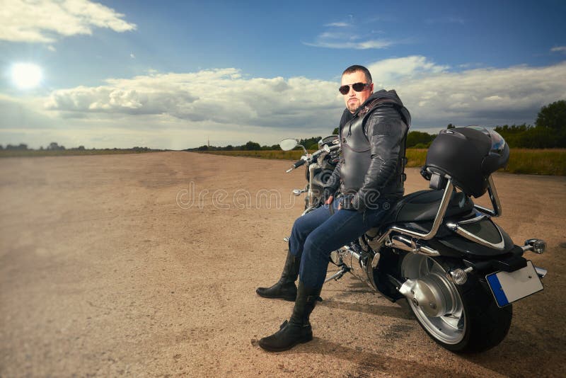 Biker Sitting on a Motorcycle. Stock Image - Image of bike, journey ...