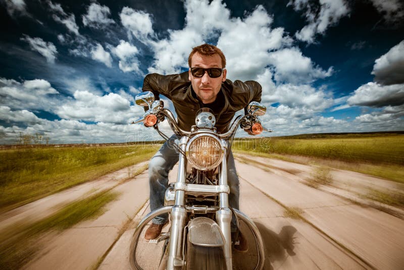 Biker racing on the road stock photo. Image of motorcyclist - 124613664
