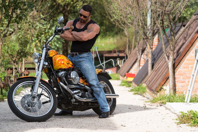 Muscular Man and Motorcycle Editorial Stock Image - Image of brand ...