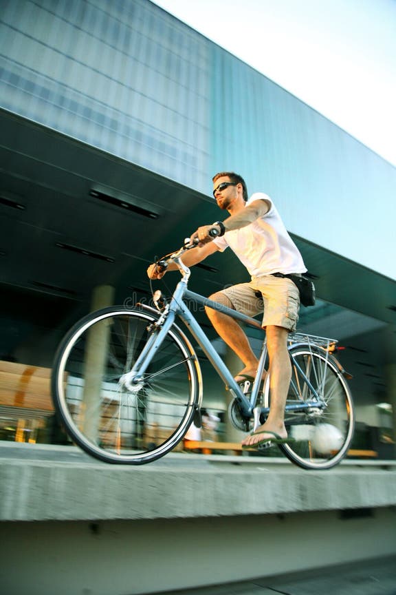 Biking in the city stock image. Image of bleached, glasses - 20765341