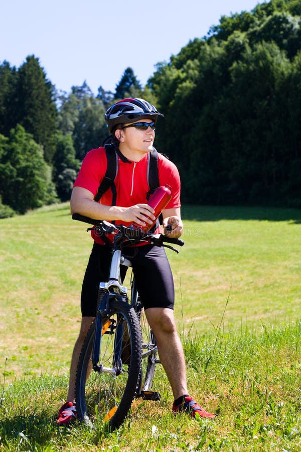 Biking man stock image. Image of biking, sports, outdoors - 9556631
