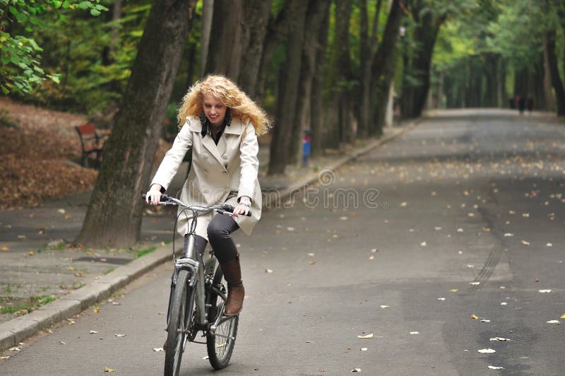 Biking in park stock image. Image of beauty, bike, smile - 16595609