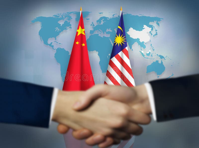 Two People Shaking Hands in Front of Malaysia and China Flags Stock ...