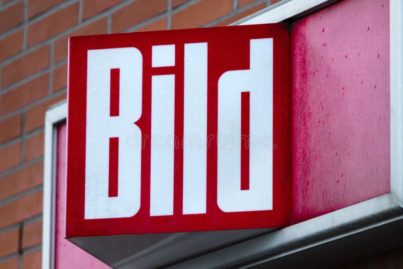 Bild Logo Visible through a Magnifying Glass. Editorial Photography ...