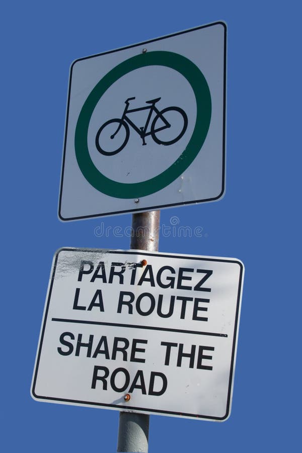 Bilingual Share the Road Sign Stock Image - Image of french, sign: 1478003