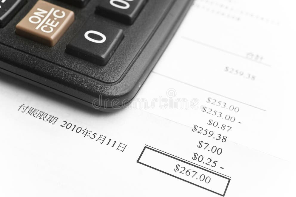 Bill and calculator stock image. Image of calculator - 14159435