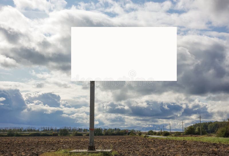 Billboard with Empty Place for Writing Text on Field and Sky Background ...