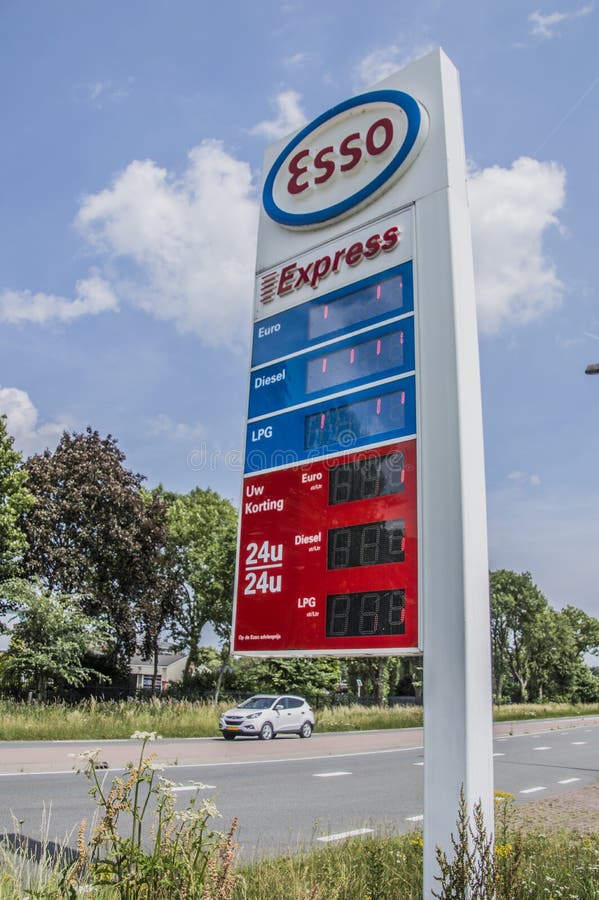 Esso Express Petrol Fuel Station with Large Appartment Building ...