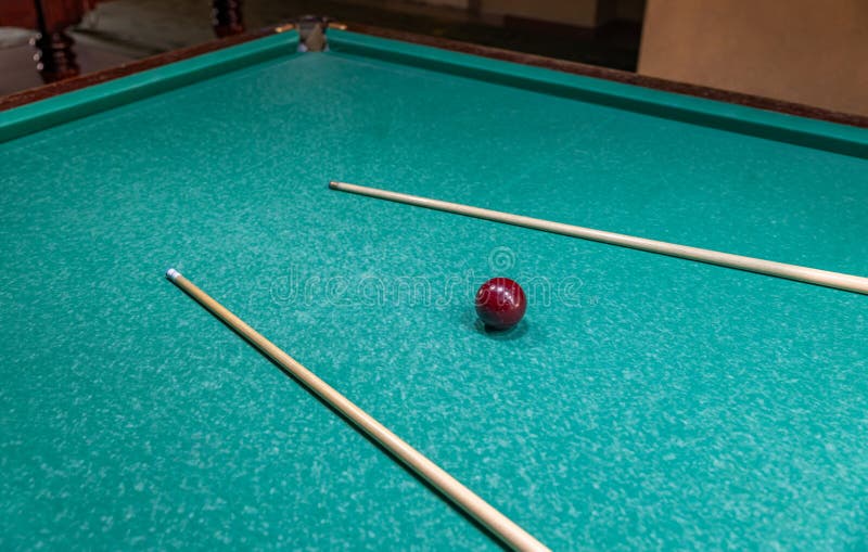 Billiard Accessories Balls and Cross Cue on a Billiard Table Stock ...
