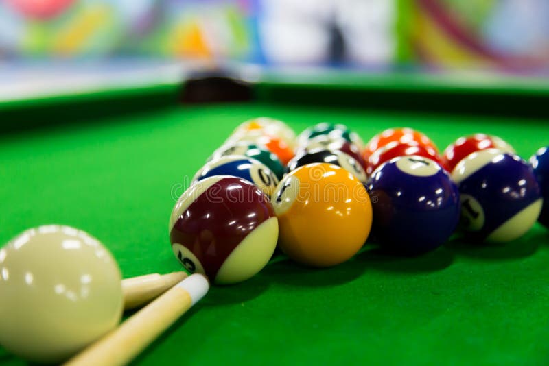 Billiard Balls Arranged on a Green Pool Table Stock Image - Image of ...