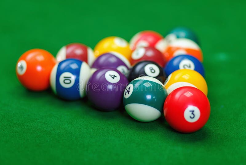 Billiard Balls in a Green Pool Table Stock Photo - Image of game ...