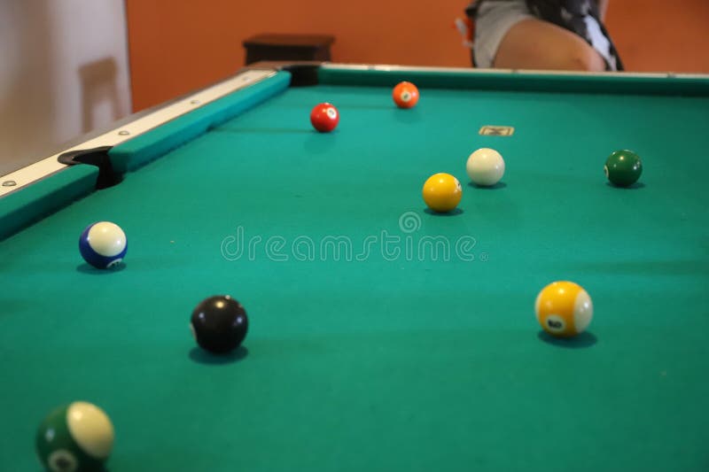 Billiard Table with Balls and Players Around. Background with Copy ...