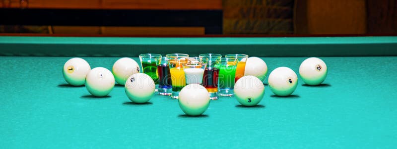 On a Billiard Table Stand with Coloured Glasses of Alcohol. Stock Image ...