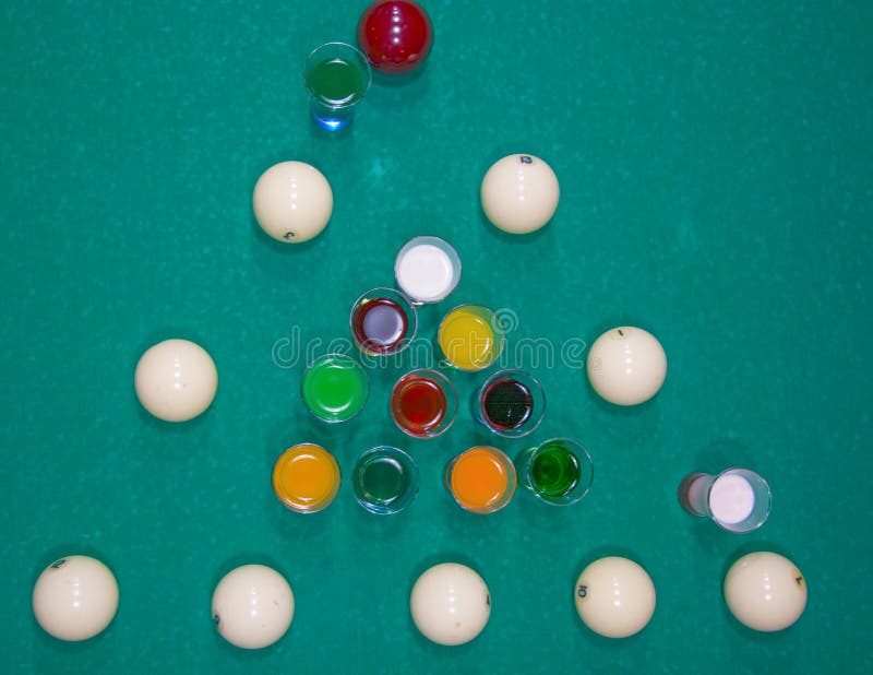 On a Billiard Table Stand with Coloured Glasses of Alcohol. Stock Photo ...