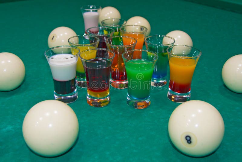 On a Billiard Table Stand with Coloured Glasses of Alcohol. Stock Photo ...