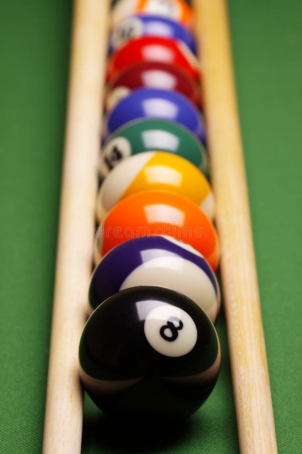 Billiard Balls Arranged on a Green Pool Table Stock Image - Image of ...