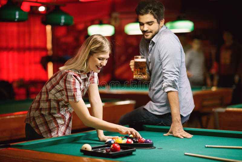 Billiard - Young Couple Sorting Balls for Beginning Game Stock Image ...