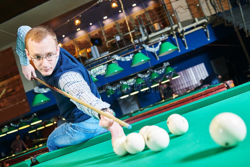 Man Playing Billiards in Club Stock Photo - Image of club, game: 120293436