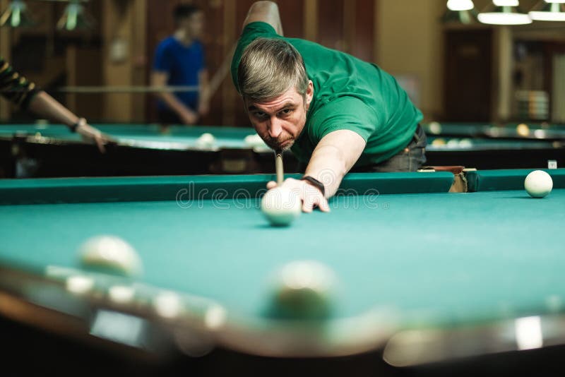 A Pool Player Takes Aim at the Ball Stock Image - Image of aiming ...