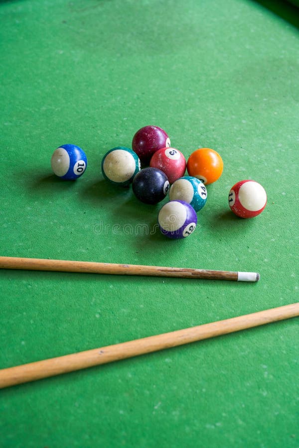 Billiards and Pool Cues on the Pool Table Stock Photo - Image of green ...
