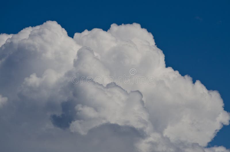 Billowing Cumulus Clouds Boiling in the Bright Blue Summer Sky Stock ...