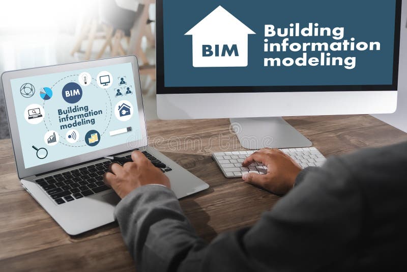 BIM Business Team Hands at Work with Financial Reports BIM - Building ...