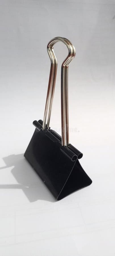 Binder Clip Used As a Paperclip Side View Stock Photo - Image of used ...