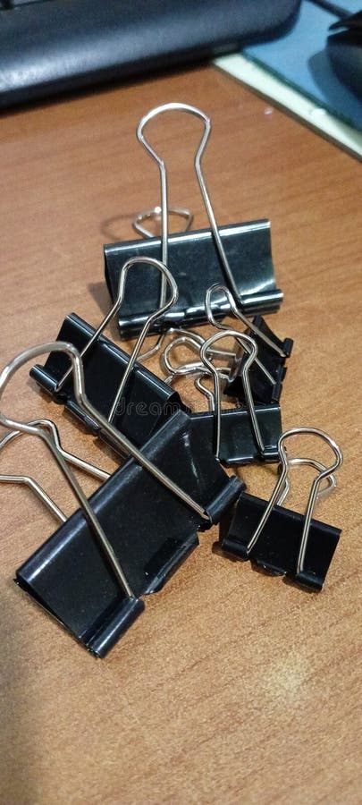 Binder Paper Clips of Various Sizes for Office Equipment Stock Photo ...
