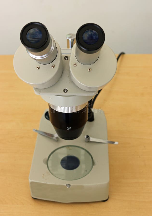 Binocular Microscope on Table Stock Image - Image of laboratory, table ...