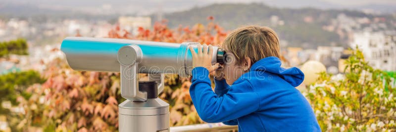 Binoscope. Stationary City Binoculars. a Boy Looks at the City through ...