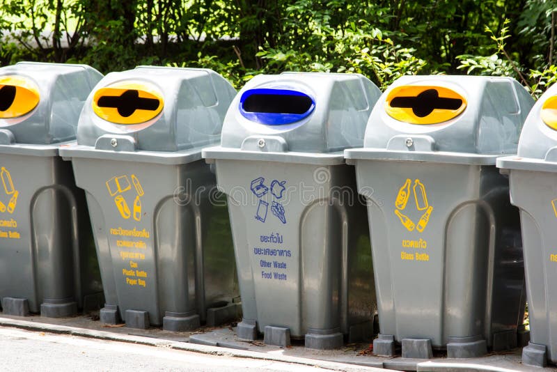 The bins in the park. stock photo. Image of garbage, arrow - 73535554