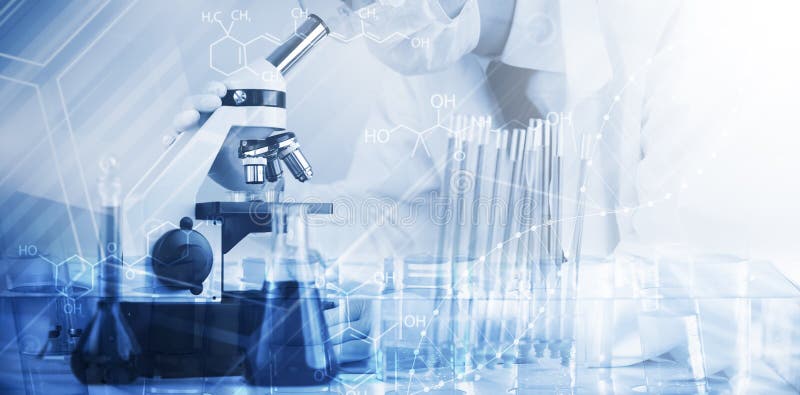 Biochemical Research Scientist Working with a Microscope for the Virus ...