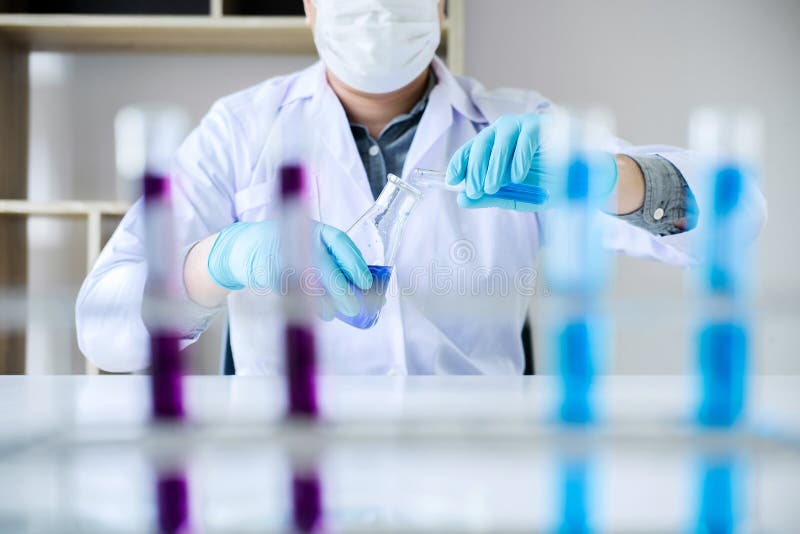 Biochemistry Laboratory Research, Chemist is Analyzing Sample in Stock ...
