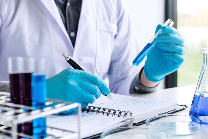 Biochemistry Laboratory Research, Chemist is Analyzing Sample and ...