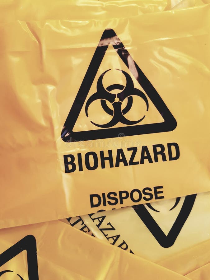 Biohazard Sign on Yellow Bag Stock Image - Image of hazardous, brown ...