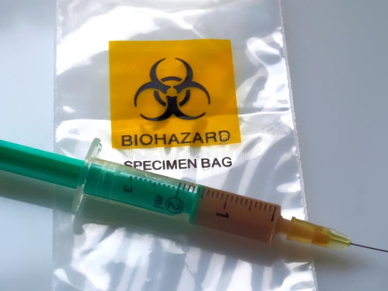 Biohazard Specimen Bag with a Syringe and Brown Liquid Stock Photo ...