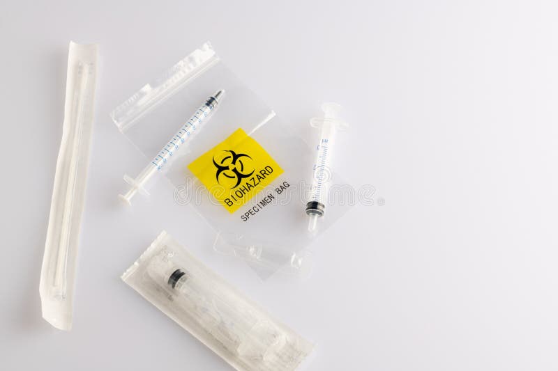 Biohazard Specimen Bag with a Syringe and Brown Liquid Stock Photo ...